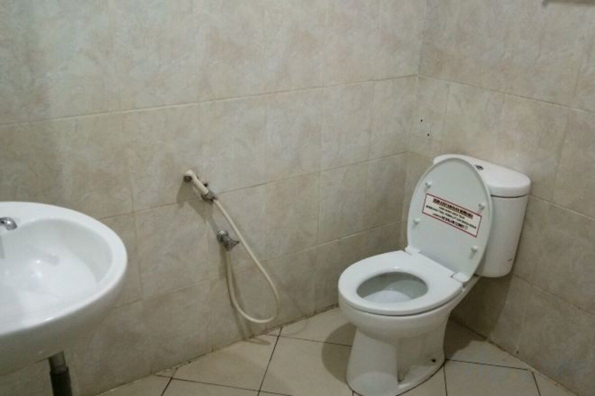 Casa de banho | Um polibã, toalhas fornecidas