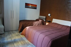 Quarto conforto | Escrivaninha, Wi-Fi de cortesia