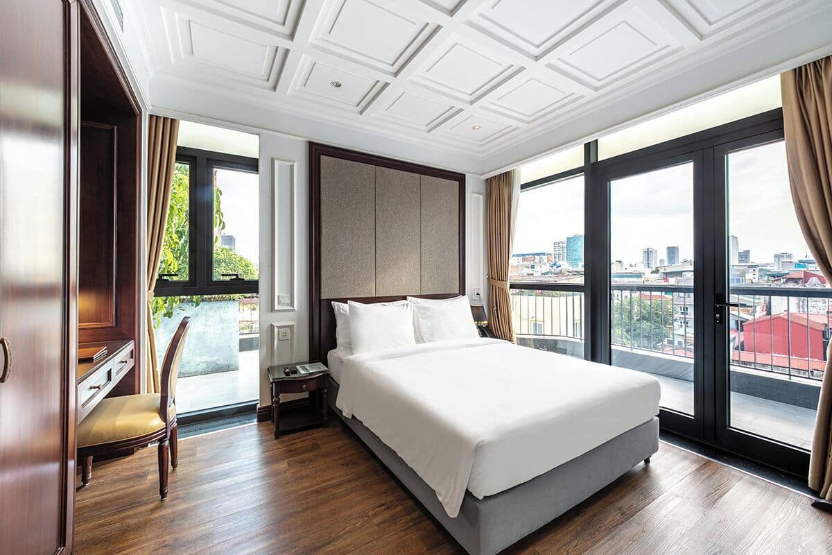 Quarto Duplo Deluxe | Minibar, cofre no quarto, cortinas/cortinados opacos