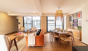 Apartamento luxo | Área de estar | TV de tela plana