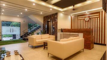 Quarto Duplo Deluxe | Sala de estar