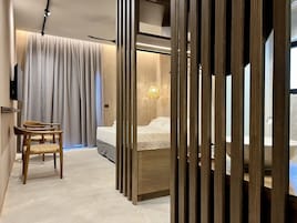 Suite Júnior, vista para a praia | 2 quartos, roupa de alta qualidade, cortinas/cortinados opacos