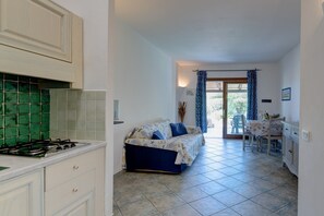 Apartamento Standard, 1 cama de casal e sofá-cama (Palau Green Village 1 Bedroom) | Sala | Televisor