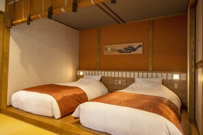 Minibar, cofre no quarto, Wi-fi grátis, roupa de cama fornecida 