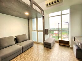 Apartamento Deluxe | Sala de estar