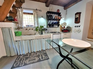 Casa | Cozinha privada | Uma cadeira de bebé