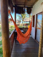 Suíte standard, acesso à piscina, de frente para a praia | Área de estar