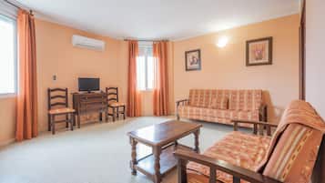 Quarto família | Edredons de pluma, frigobar, quartos à prova de som, Wi-Fi de cortesia