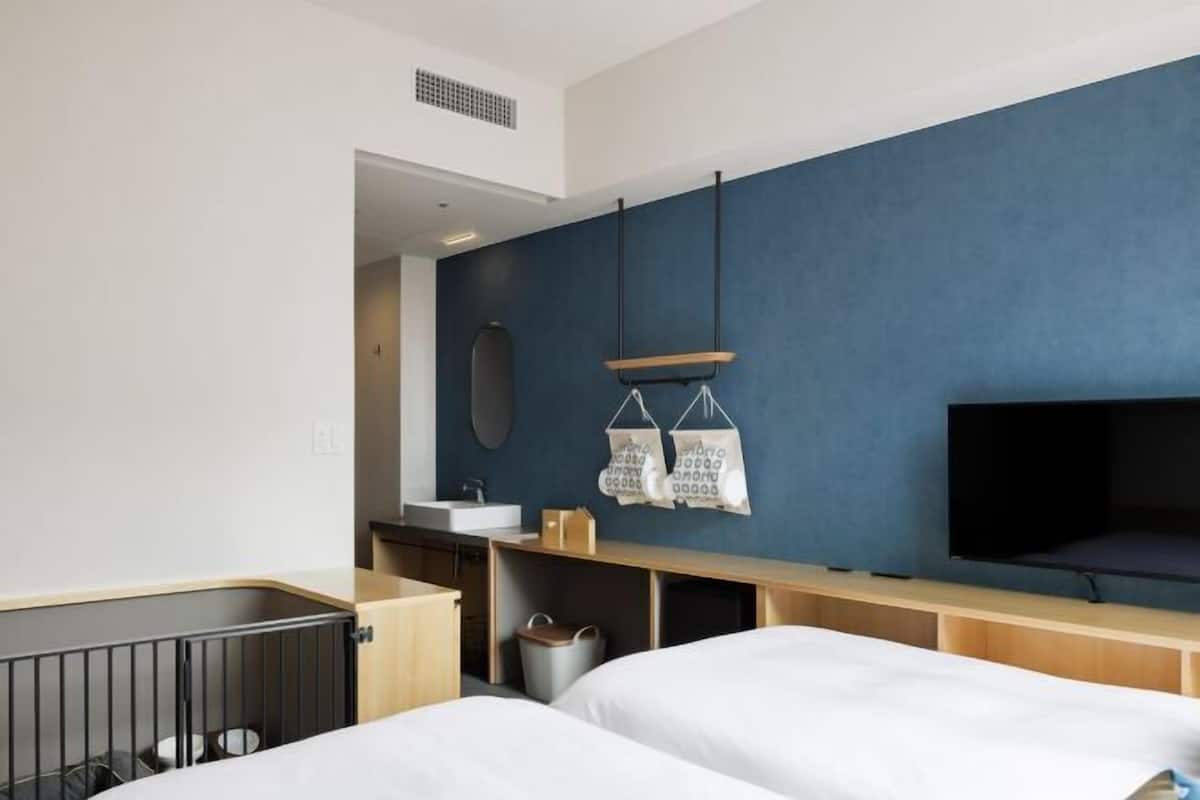 Roupas de cama premium, cofres nos quartos, quartos à prova de som