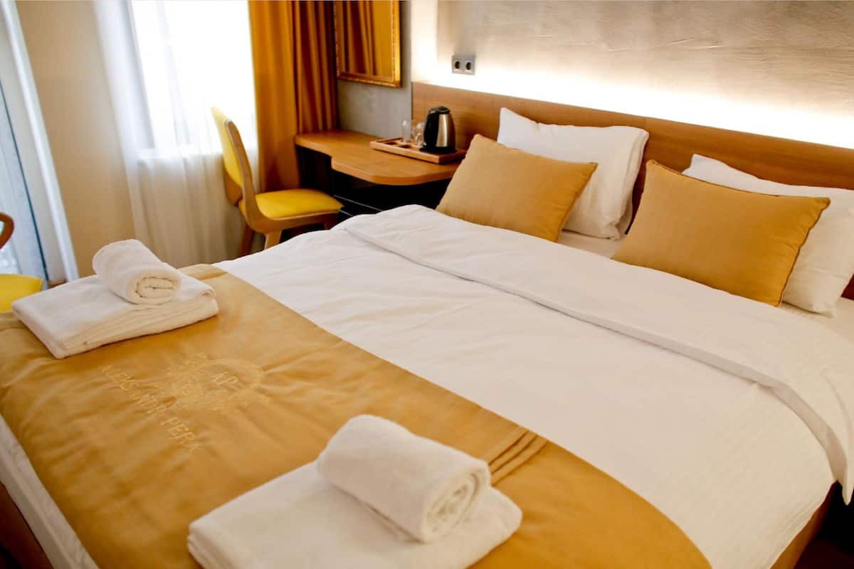 Roupa de alta qualidade, minibar, cofre no quarto