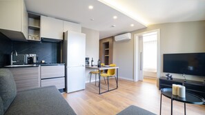 Suite Júnior | Sala de estar | Piso aquecido 