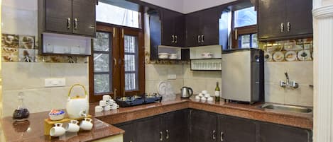 Vila executiva | Cozinha privada | Cafeteira/chaleira