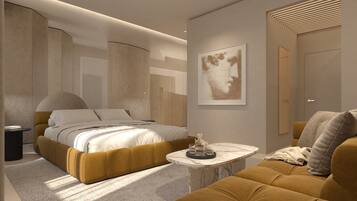 Quarto moderno com uma cama grande, um sofá, uma mesinha de centro e uma obra de arte pendurada na parede.