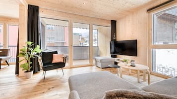 Apartamento superior | Área de estar | Pisos aquecidos