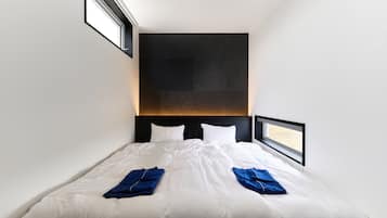 Suíte, vista para o oceano | 1 quarto, edredons de pluma, cofres nos quartos, cortinas blackout