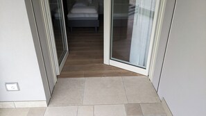 Quarto Duplo ou Twin Comfort, adaptado para pessoas com dificuldades de mobilidade | Terraço/pátio interior