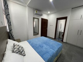 Apartamento conforto | Banheiro | Roupões de banho 