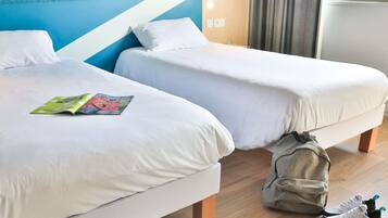 Quarto Standard, 2 camas individuais | Secretária, quartos insonorizados, Wi-fi grátis