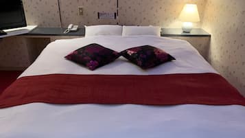 Edredões de penas, minibar, cortinas/cortinados opacos