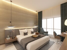 Suíte, 1 quarto | Frigobar, cofres nos quartos, escrivaninha