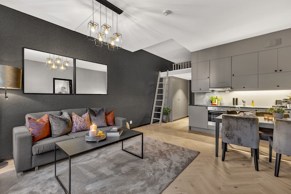 Apartamento, 1 quarto | Área de estar | TV de tela plana 30 polegadas com canais via satélite, TV
