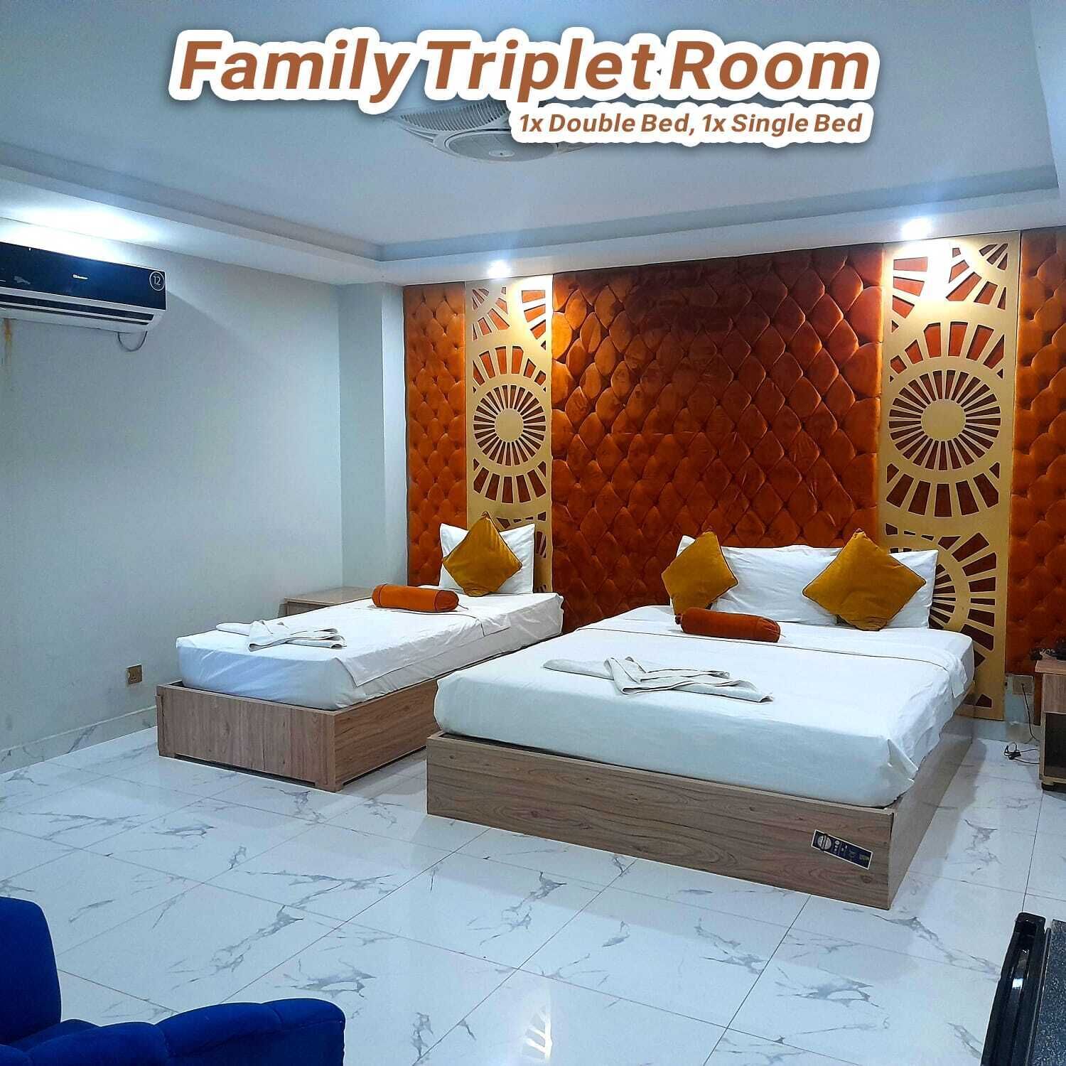 Quarto Triplo de Luxo, várias camas, não fumadores, Vista para a cidade | Minibar, com decoração personalizada, com mobília individualizada 