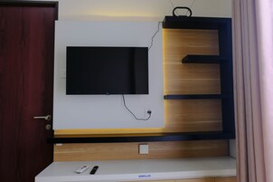 Apartamento Deluxe, 2 quartos | Sala de estar