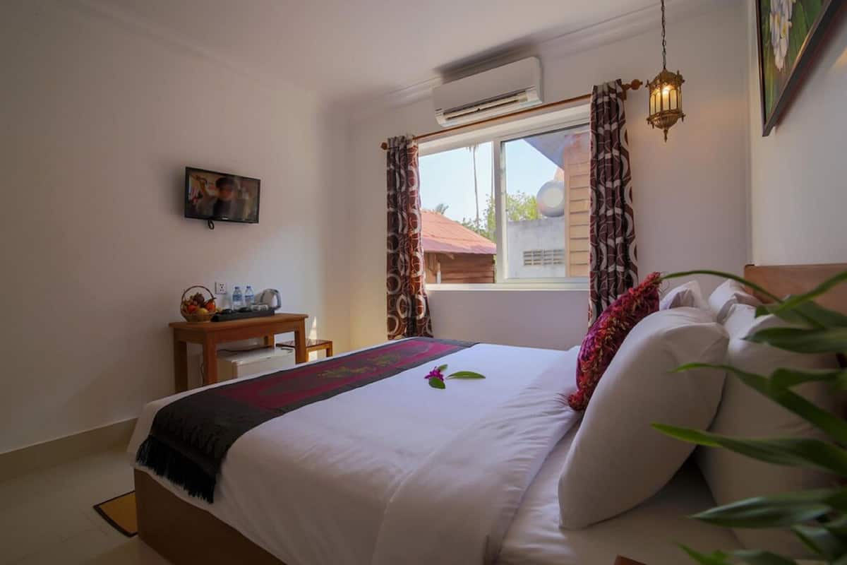 Quarto casal superior | Roupas de cama premium, frigobar, cofres nos quartos, escrivaninha