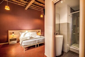 Quarto luxo | Frigobar, escrivaninha, Wi-Fi de cortesia, roupa de cama