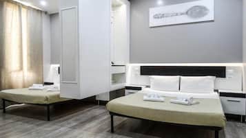 Quarto Quádruplo Económico | Wi-fi grátis, roupa de cama fornecida