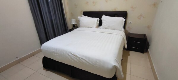 Hotel O Kost Axcel - Banjarmasin