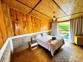 Quarto duplo exclusivo, 1 cama Queen, vista para o jardim | Wi-Fi de cortesia, roupa de cama