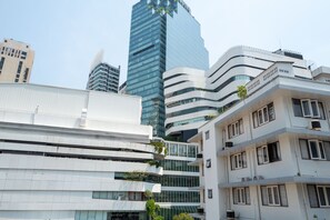 Quarto quádruplo família, várias camas, banheiro privativo | Vista para a cidade