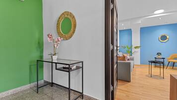 Apartamento executivo | Área de estar | TV LCD 90 cm com canais digitais, TV, Netflix