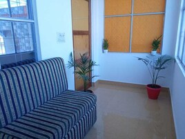 Quarto Deluxe | Sala de estar