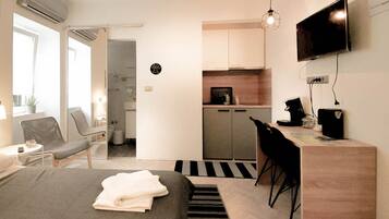 Estúdio urbano | Cozinha privada | Frigobar, cooktop, chaleira elétrica