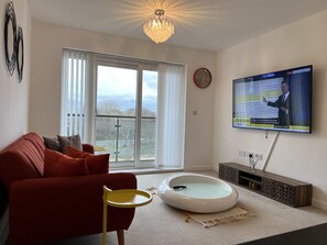 Apartamento, 2 camas queen-size | Sala de estar