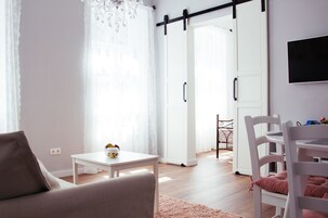 Apartamento exclusivo | Área de estar | TV LCD 40 polegadas com canais digitais, TV