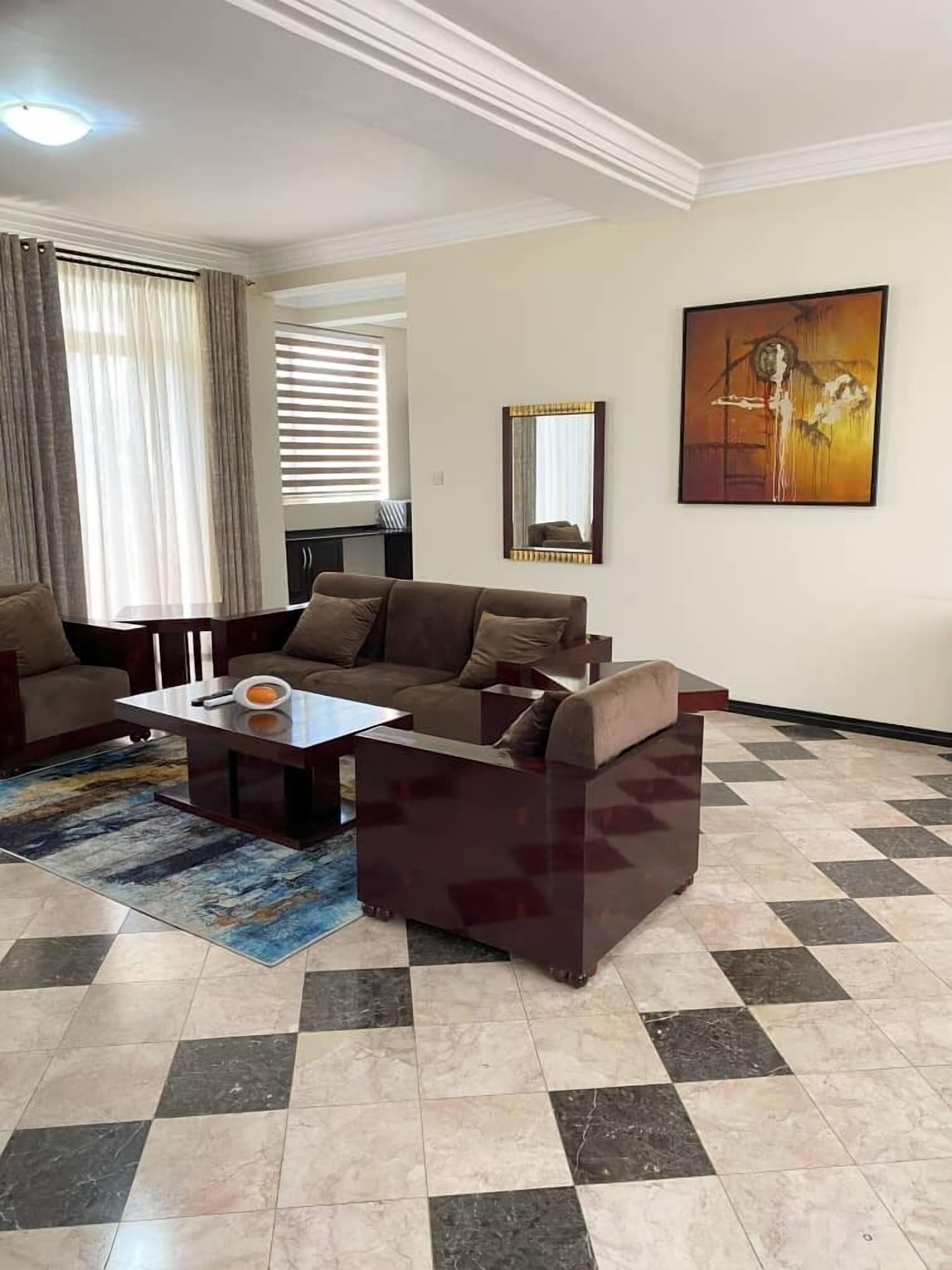 Apartamento Executivo | Sala de estar | Televisor LED de 40 polegadas com canais via satélite, televisor 