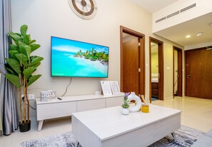 Apartamento Design | Sala de estar | Smart TV de 55 de polegadas com canais por cabo, televisor, Netflix