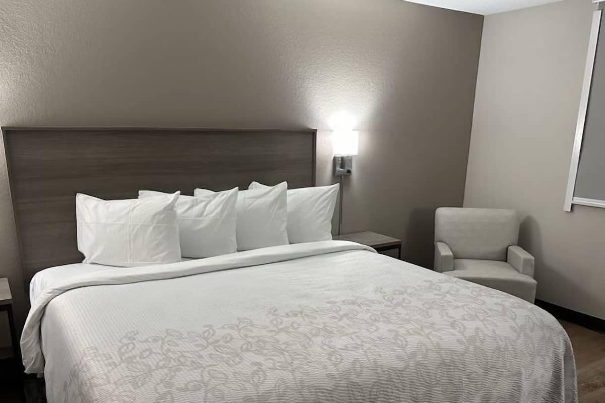 Cortinas blackout, Wi-Fi de cortesia, roupa de cama