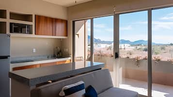 Apartamento | Área de estar | TV de tela plana 65 polegadas com canais a cabo, TV