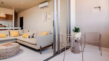 Apartamento | Área de estar | TV de tela plana 65 polegadas com canais a cabo, TV
