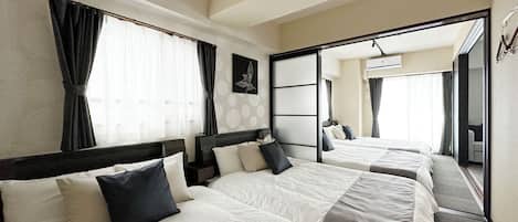 Apartamento executivo, 2 quartos, para não fumantes, vista para a cidade | 1 quarto, individualmente decorados, espaço de trabalho para notebook