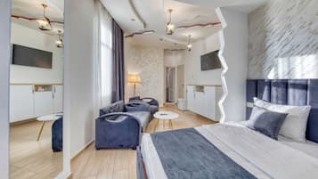Quarto casal standard | Área de estar