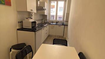 Apartamento, 2 quartos, vista para a cidade | Opções para refeição
