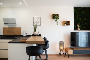 Apartamento Superior (7/22) | Sala de estar | Smart TV de 55 polegadas com canais via satélite, televisor 