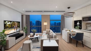 Apartamento Deluxe, 1 quarto | Sala de estar | Televisor LED