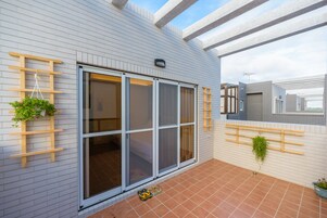 Quarto Triplo Superior | Terraço/pátio interior