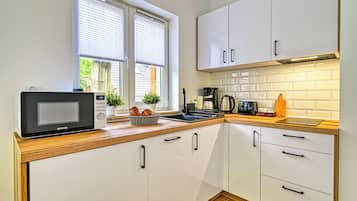 Apartament (5b/16) | Cozinha privada | Geladeira, micro-ondas, cooktop, lava-louças